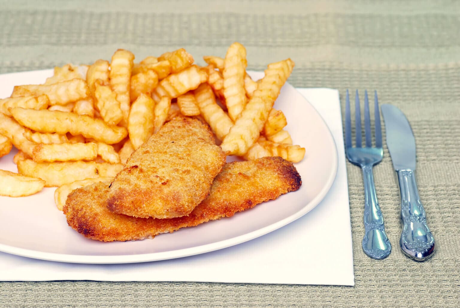 Crispy Delights: Potato Chip Encrusted Baked Fish and Chips